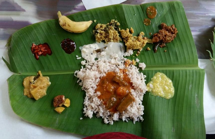 authentic-kerala-style-sadya-on-banana-leaf • Tech Travel Eat